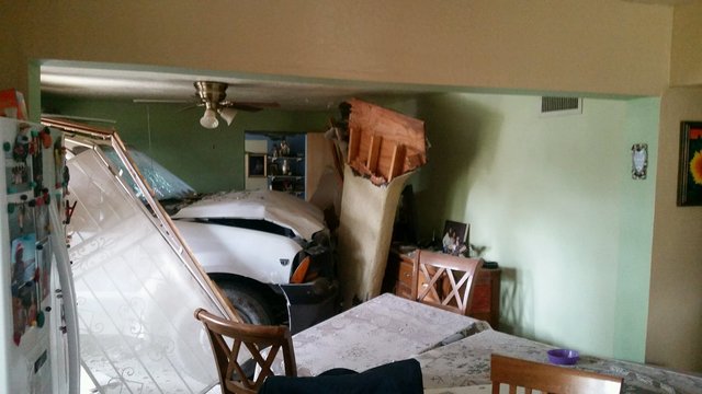 Stolen truck crashes into house while family inside - KGUN9.com